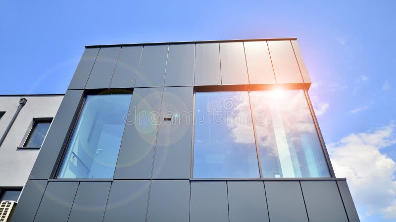 Graphite Facade and Large Windows on a Fragment of an Office Building ...