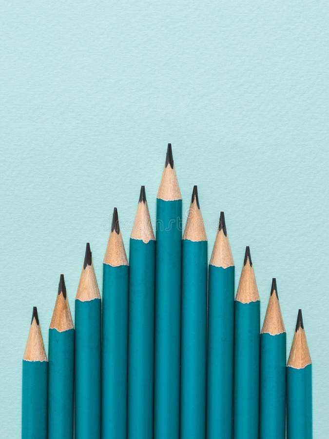 Graphite Pencils on a Blue Background Laid in the Form of a Pyramid ...