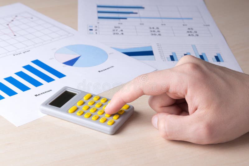 Graphs, Charts and Male Hand with Calculator Stock Photo - Image of ...
