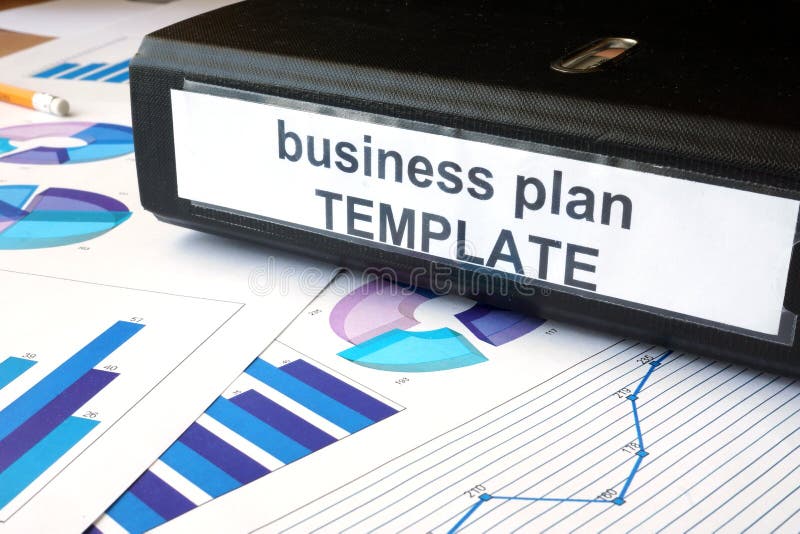 Graphs and File Folder with Label Business Plan Template. Stock Photo ...