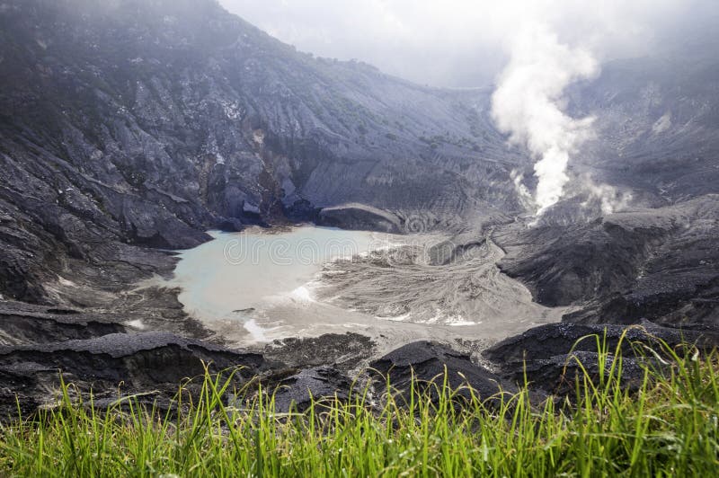 Grass on Foreground of Volcano Mountain Stock Photo - Image of mist ...