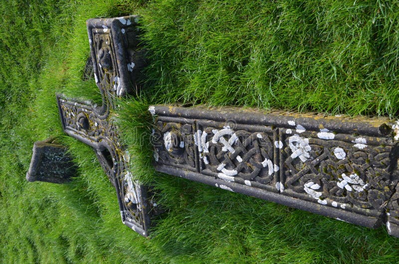Grass Growing Out of the Ruins of a Fallen Cross Stock Photo - Image of ...