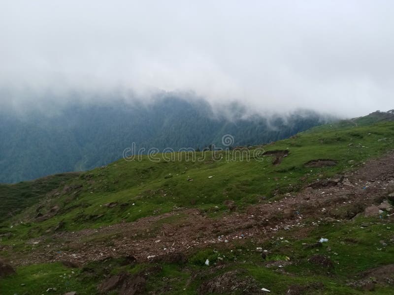 Aesthetic Grass Land, Mountains, Clouds, Mist Stock Photo - Image of ...