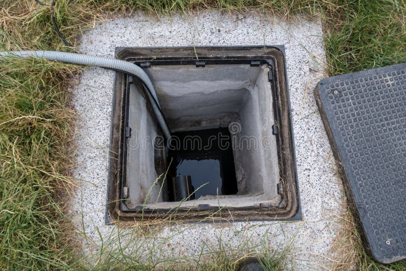 Rain well with pumps stock photo. Image of piping, sewage - 188694656