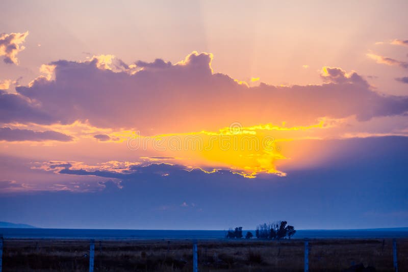 Grassland at sunset stock photo. Image of sunny, high - 45854622