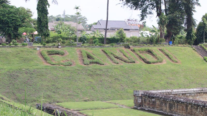 CANDI Carved into Grassy Hillside Stock Photo - Image of travel, lawn ...