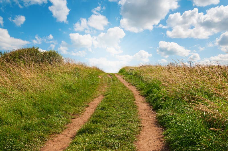 Grassy Path Facing Uphill with Blue Sky. Stock Image - Image of ...