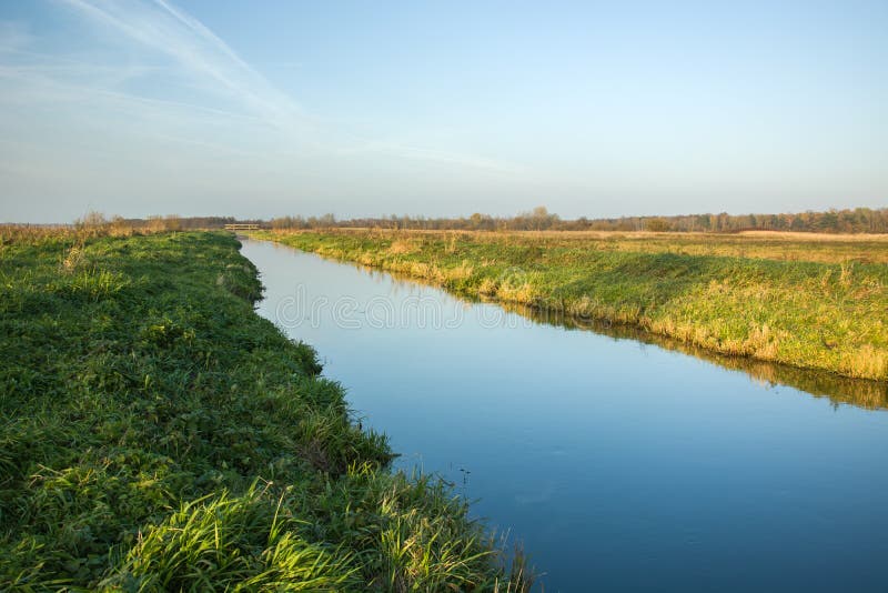 Grassy Shore and Clean River. Poland, the Uherka River Stock Photo ...