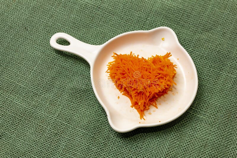 Grated carrot heart stock photo. Image of carrot, vitamins - 212948100