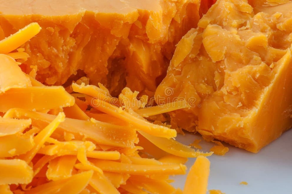 Chunks Abd Grated Hard Aged Cheddar Cheese. Stock Photo - Image of ...