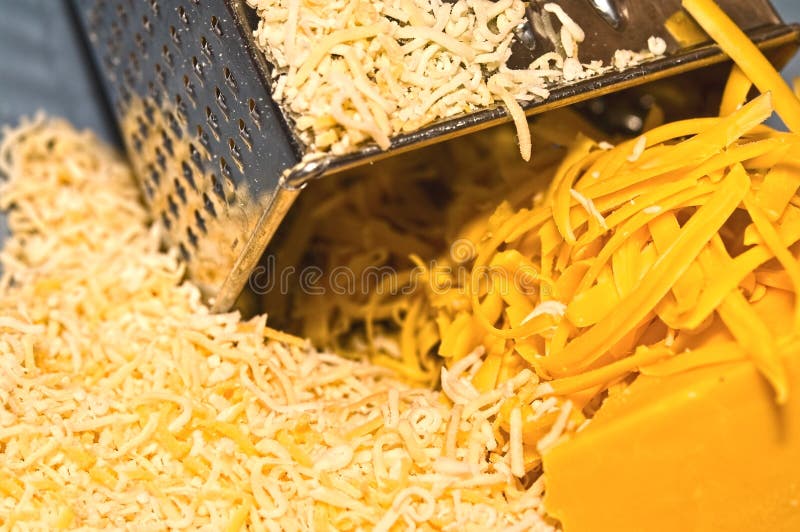 Grated Cheese Closeup stock image. Image of cheese, grate - 13011251