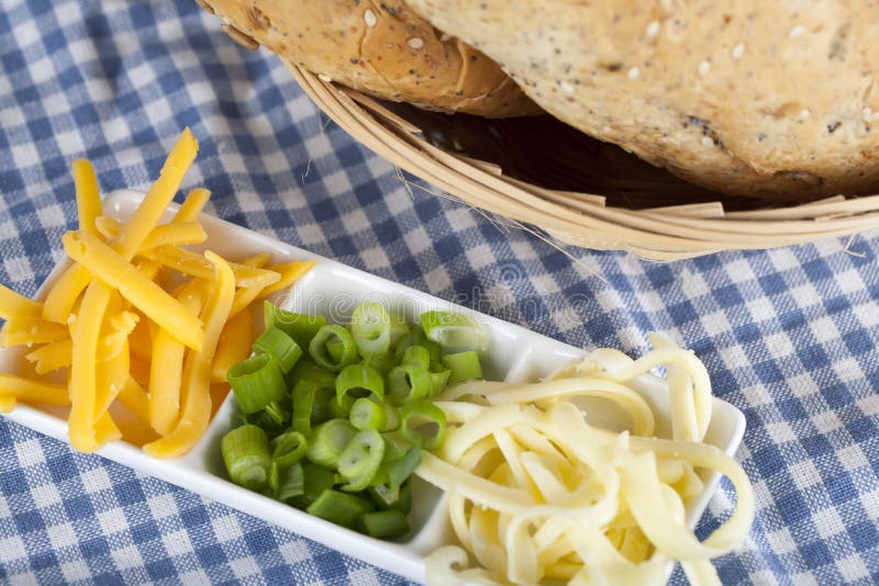 Grated Cheese with Spring Onion and Seed Bread Stock Photo - Image of ...