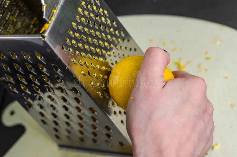 Grated Lemon Zest on a Metal Grater Stock Image - Image of fruit ...