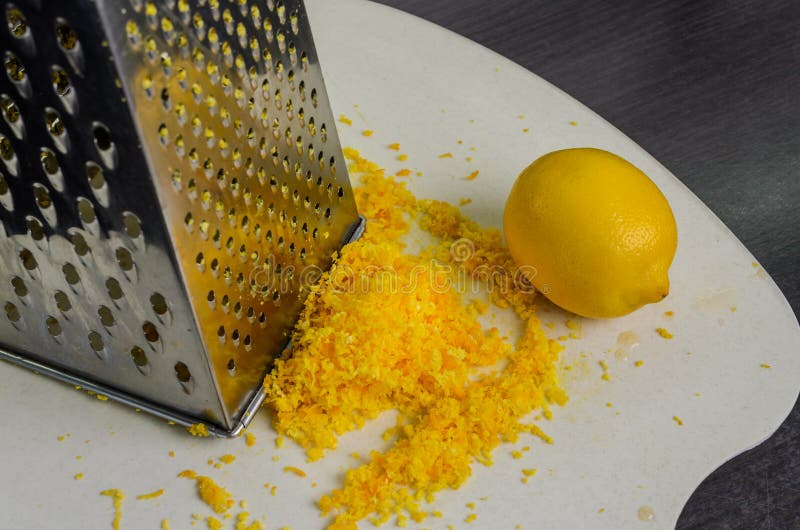 Grated Lemon Zest on a Metal Grater Stock Image - Image of fruit ...