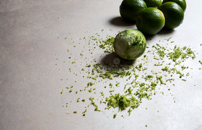 Grated Lemon with Zest of the Rind Scattered on a White Table Stock ...