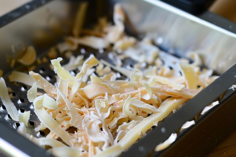 Grater with Shavings of Soap for Homemade Laundry Detergent Stock Photo ...