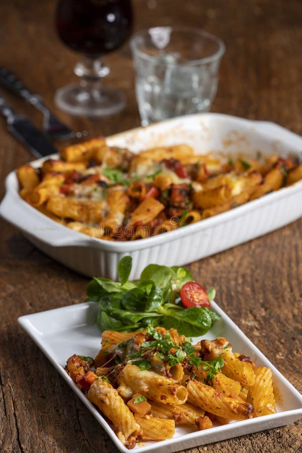 Gratinated rigatoni pasta stock photo. Image of bolognese - 275146908