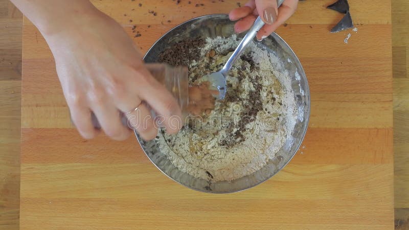 Grating Bitter Chocolate with a Hand Grater while Making a Cake Stock ...