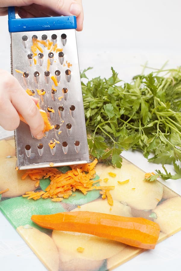 Grating carrot stock photo. Image of vegetable, kitchen - 9705752