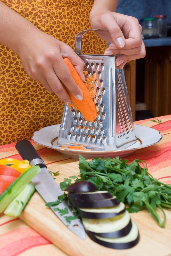 Grating carrot stock photo. Image of vegetable, kitchen - 9705752