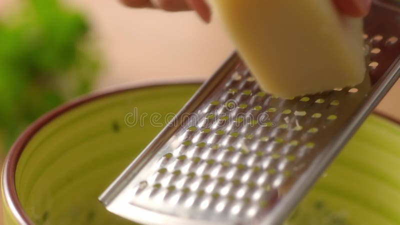 Grating Cheese into Bowl, Kitchen Prep Work. Stock Footage - Video of ...