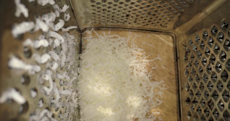 Grating Cheese Perspective from Inside the Grater Stock Footage - Video ...