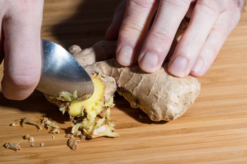 Grating ginger root stock image. Image of nutrition - 103008579