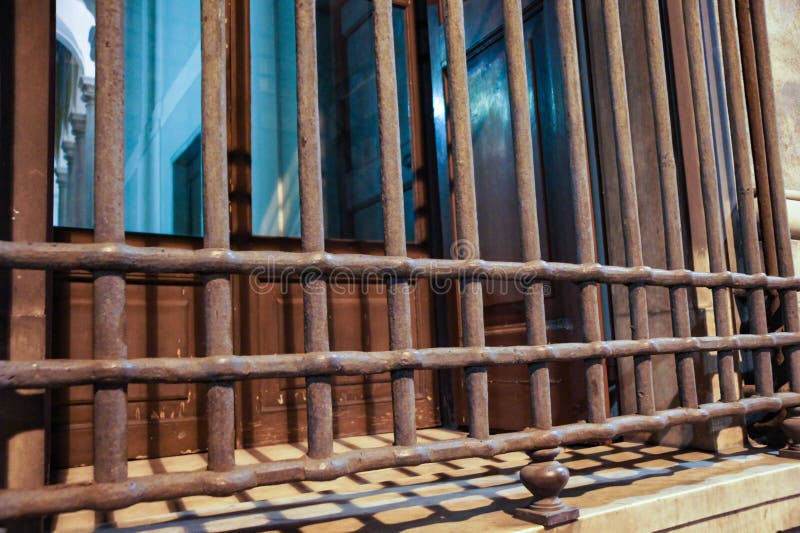 Grating of thick rods. stock image. Image of alleyway - 116422569