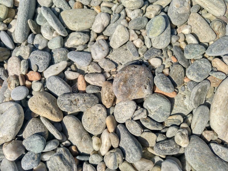 Grava natural de la playa imagen de archivo. Imagen de granada - 122746257