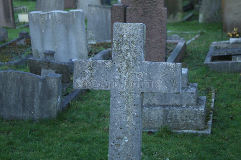 Grave stones in a cemetery stock image. Image of holy - 138764859