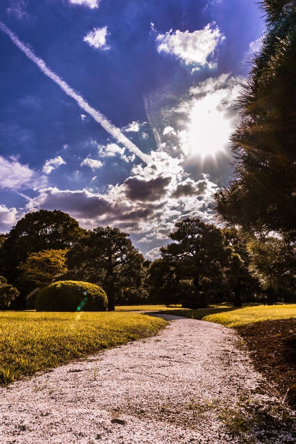 Grave Way Under a Blue Sky and Some Clouds, a really Sunny Day Stock ...