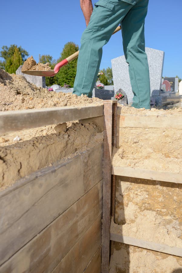 Gravedigger Digging in Cemetery Stock Photo - Image of area, laborer ...