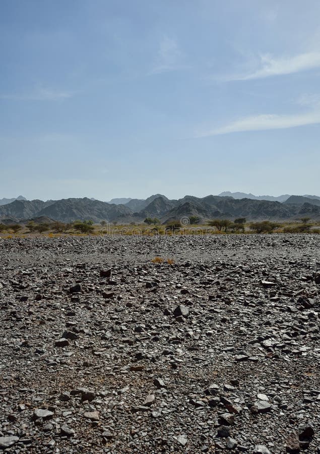 Mountain in Gravel Desert at Sunset Stock Photo - Image of desert ...