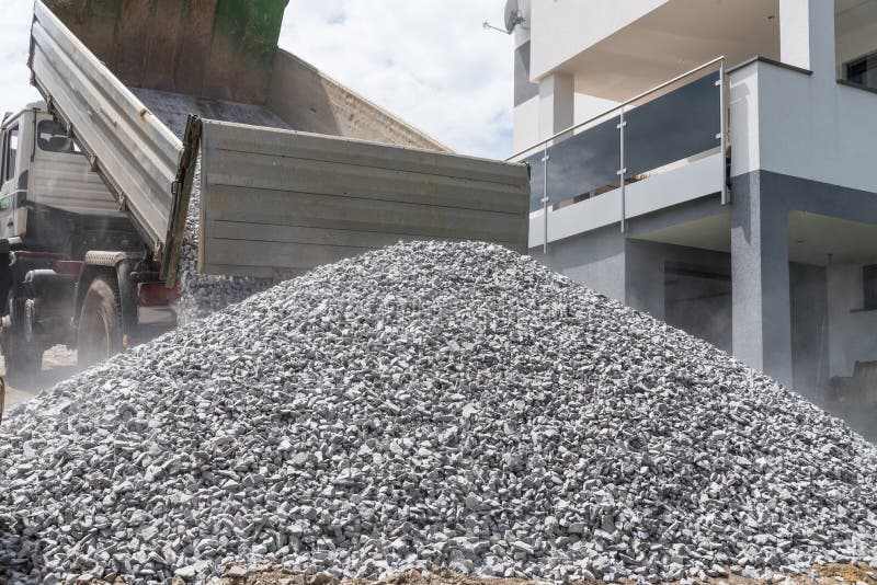 Gravel Emptied from Truck at Construction Site Stock Image - Image of ...