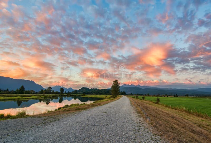 Gravel Path with Amazing Clouds Stock Photo - Image of horizon, angle ...
