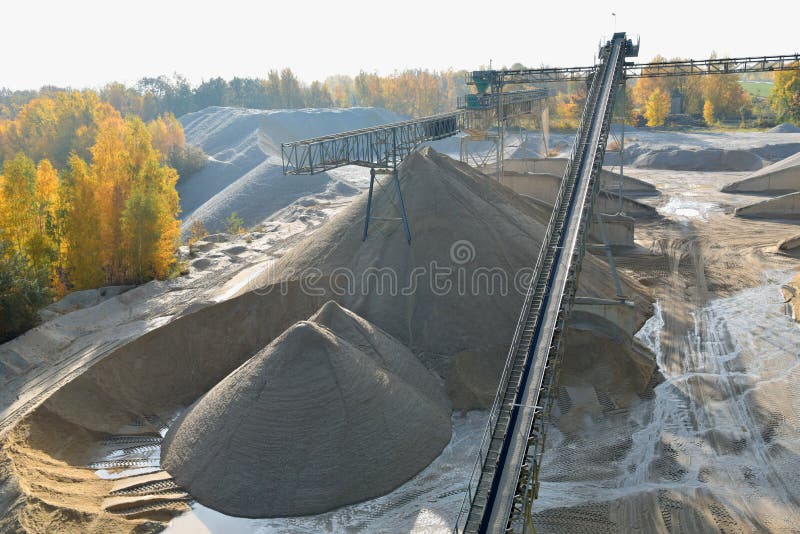 Gravel Pit: Building and Wheel Loader Loading Gravel Onto a Truck Stock ...