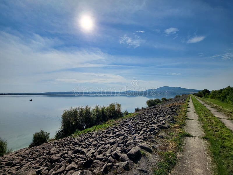 Gravel Road Along a Calm Lake Stock Photo - Image of outside, nature ...