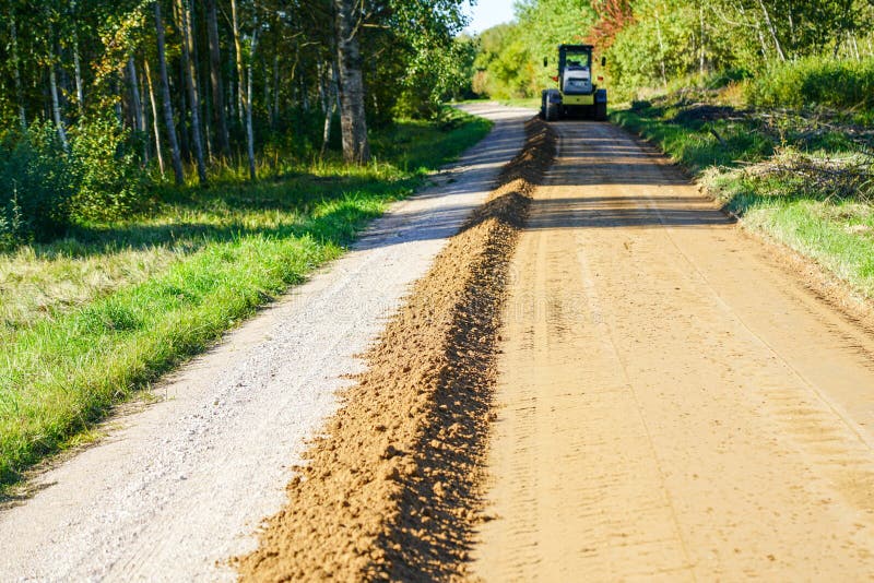 Gravel Road Leveling in Rural Areas with the Help of a Grader Stock ...