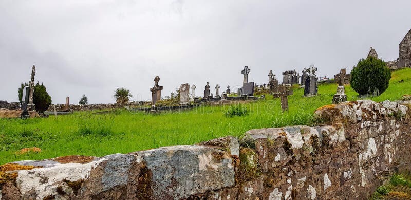 Graveyard in Ireland stock photo. Image of rundown, grass - 137917858