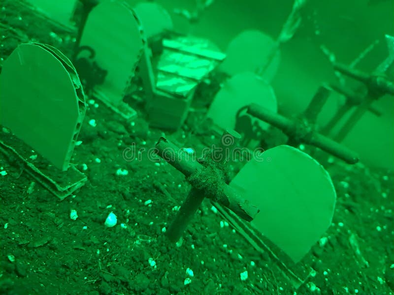 Graveyard Scene at Night with Tombstones and Crosses for Halloween ...