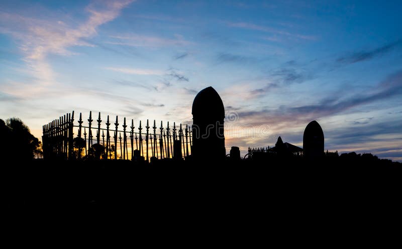 Sunset At Graveyard Pair Of Headstones Stock Image - Image of statue ...