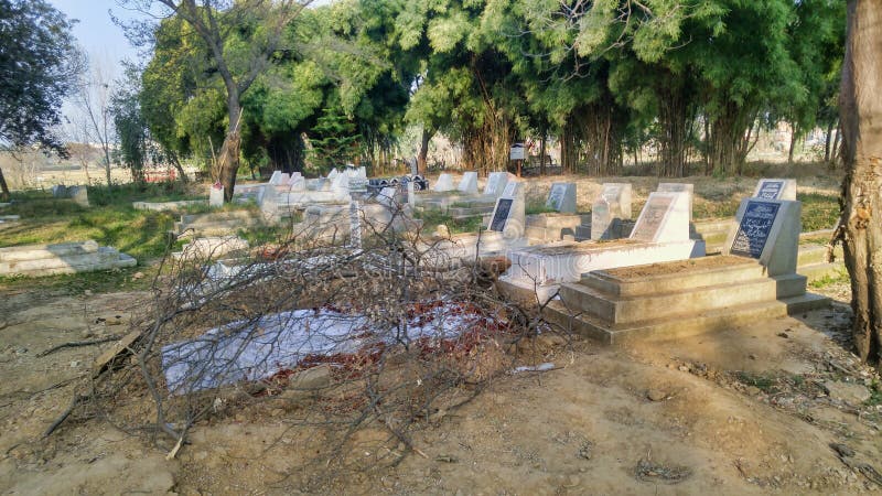 Graveyard Surrounded by Trees in the Village Stock Photo - Image of ...