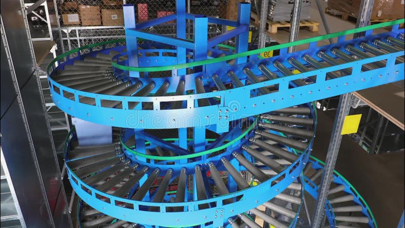 Spiral Gravity Conveyors stock video. Video of plastic - 171624383