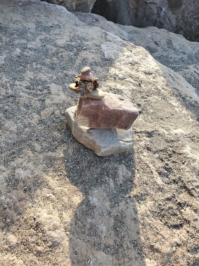 Gravity Defying Rock Sculpture on the Lakeshore Stock Photo - Image of ...