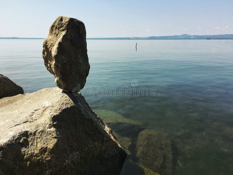 Gravity stock photo. Image of balanced, rock, lake, shore - 122994540
