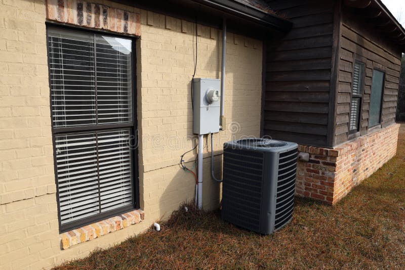 Gray Air Conditioner Condensor Unit Next To Home Stock Photo - Image of ...
