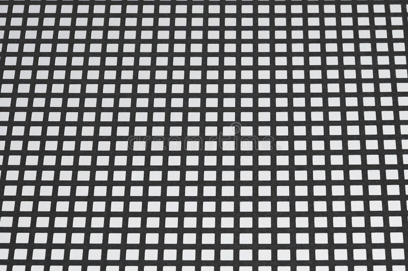Gray Background, in the Photo a Metal Grid with Square Cells on a Gray ...