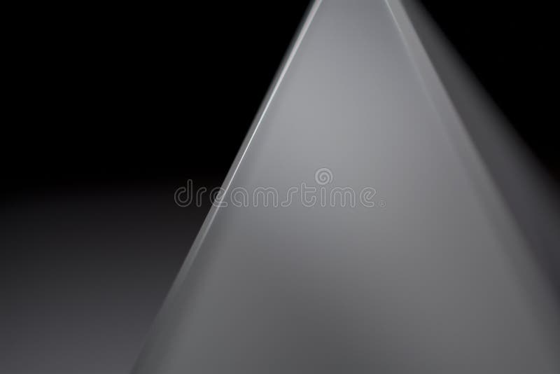Gray Background with a Pyramid Stock Image - Image of closeup ...