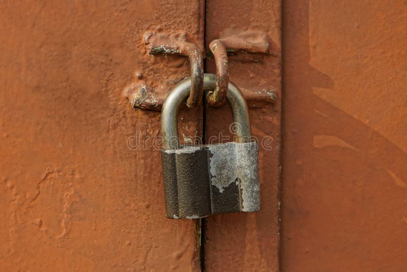 Gray Big Padlock on a Brown Iron Wall Stock Photo - Image of dirty ...