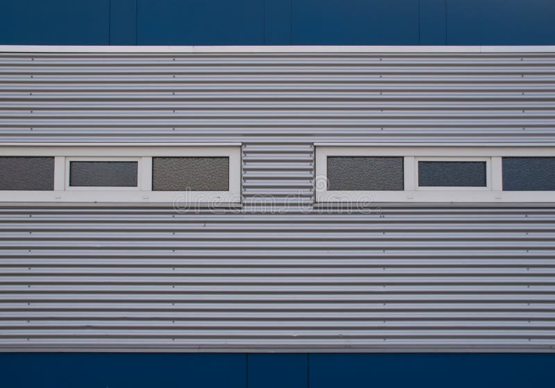 Blue and gray facade stock image. Image of industrial - 12013523